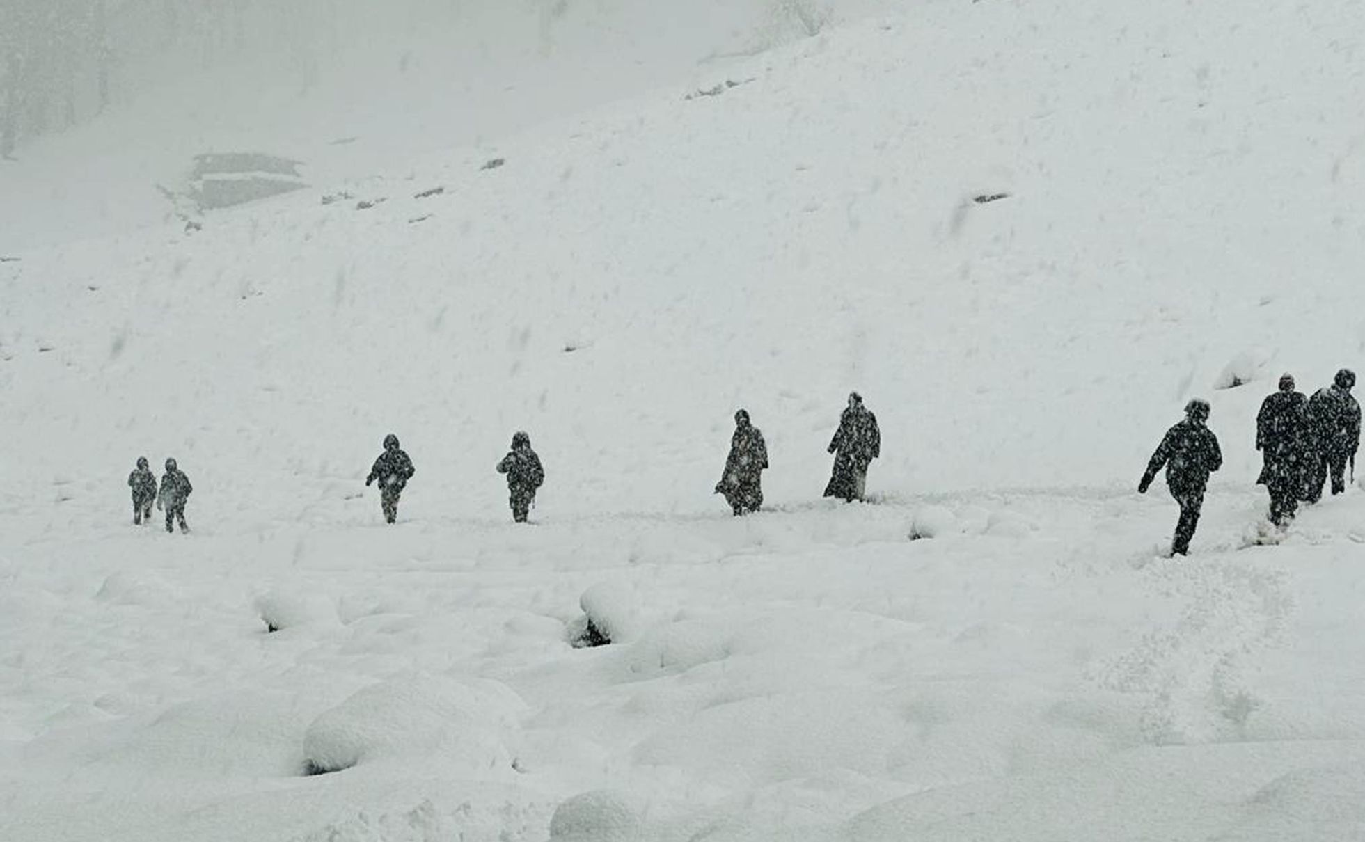 In Pictures- Rains lashes plains, upper reaches experiences snowfall in ...